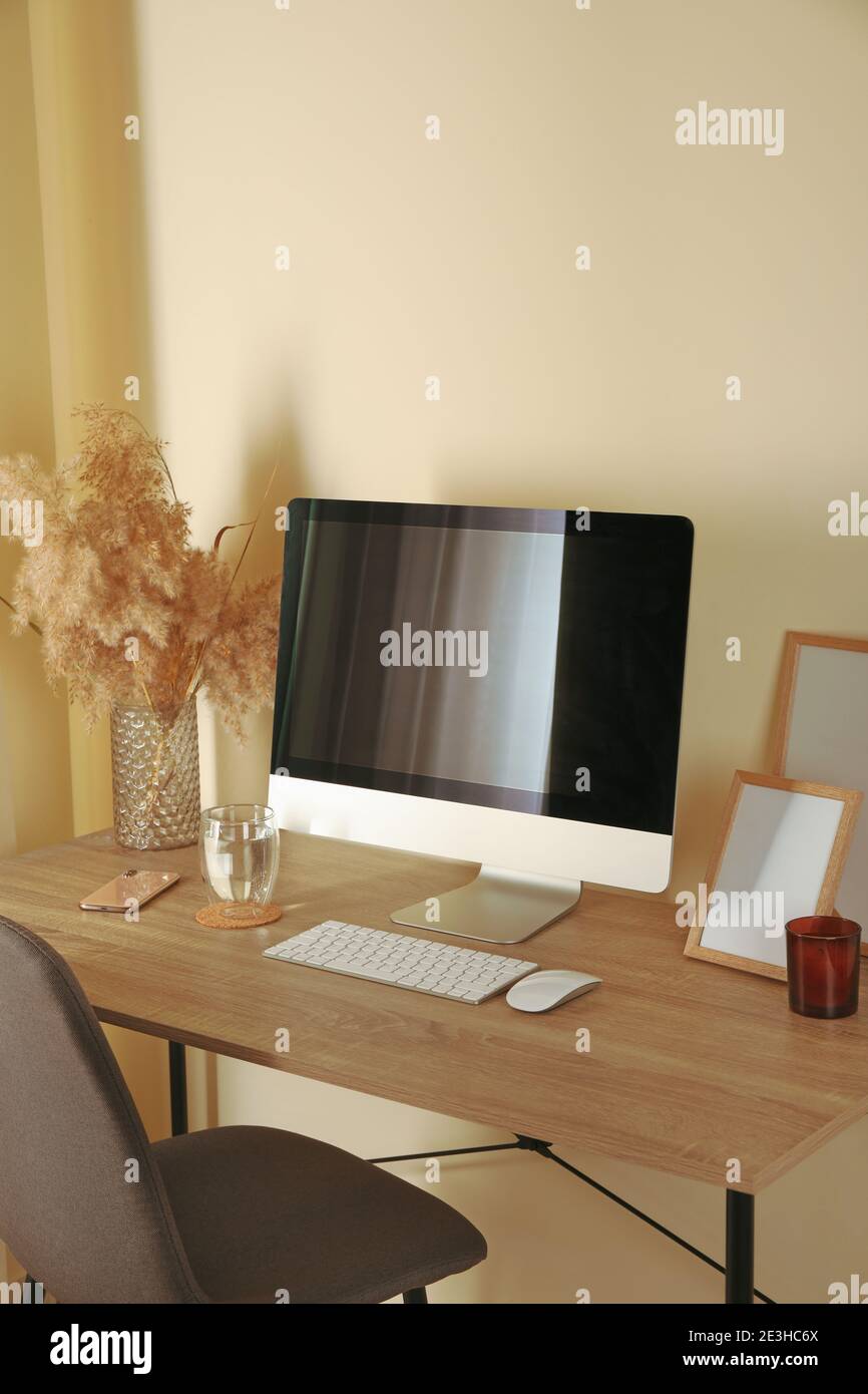 Concept of workplace with modern desktop computer on wooden table Stock ...