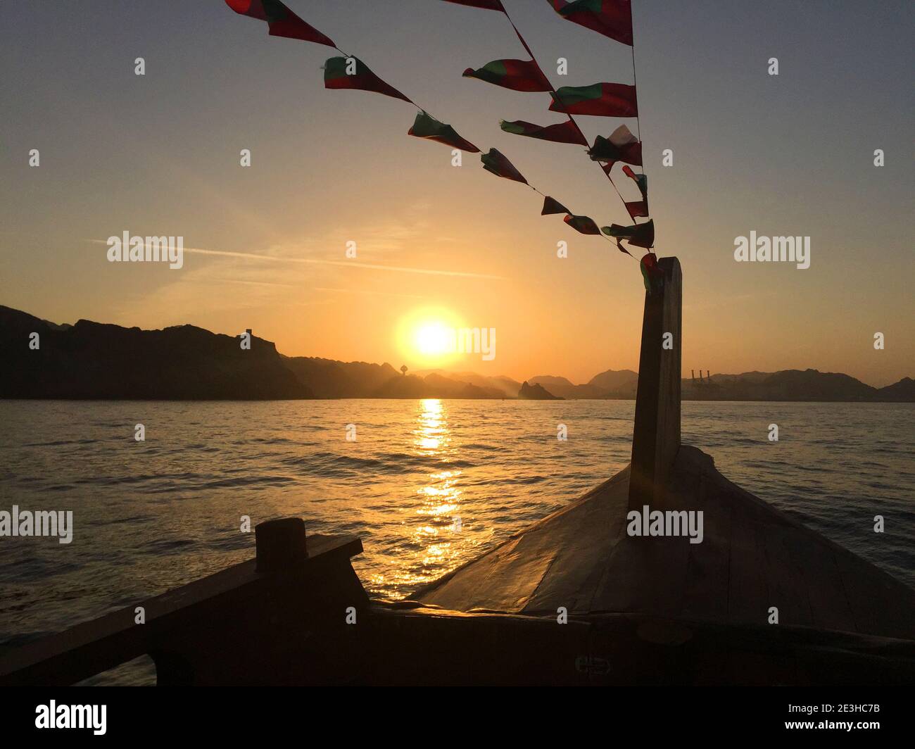 Sunset Cruise on a traditional Dhow, Muscat, Sultanate of Oman Stock ...