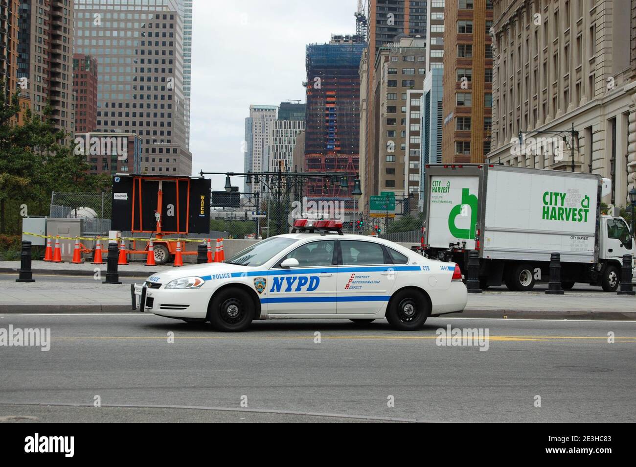 Police car in New York USA NYPD City Harvest skyscrapers cones ...