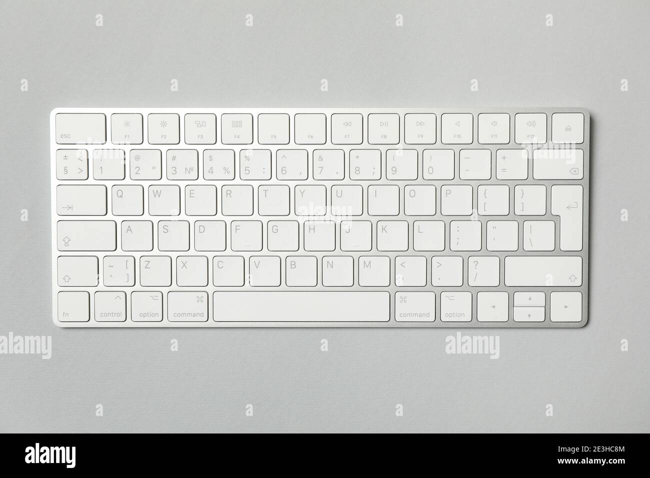 Modern computer keyboard on gray background, top view Stock Photo - Alamy