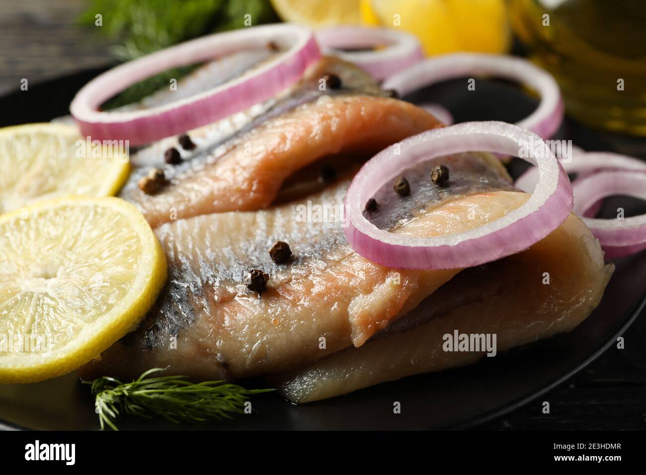 Plate with fresh herring fish, close up Stock Photo - Alamy