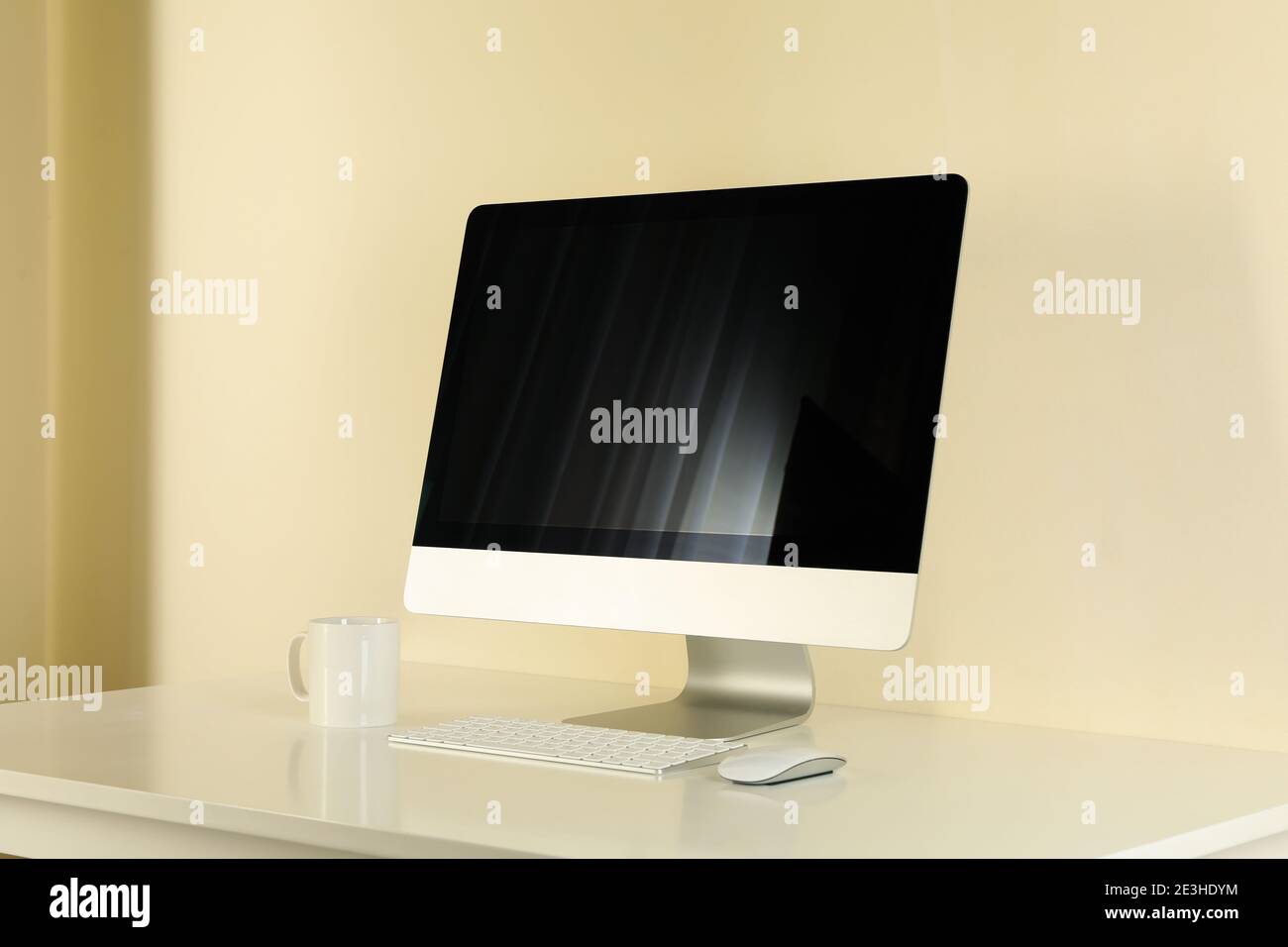 Minimalist workspace concept with desktop computer on beige background ...