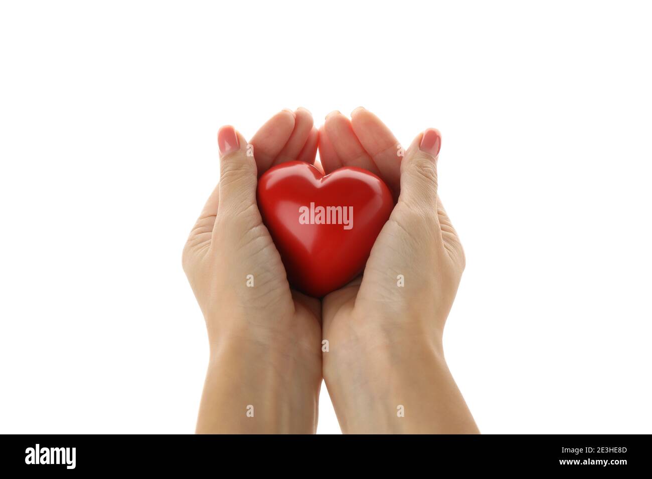 Female hands holding heart, isolated on white background Stock Photo ...