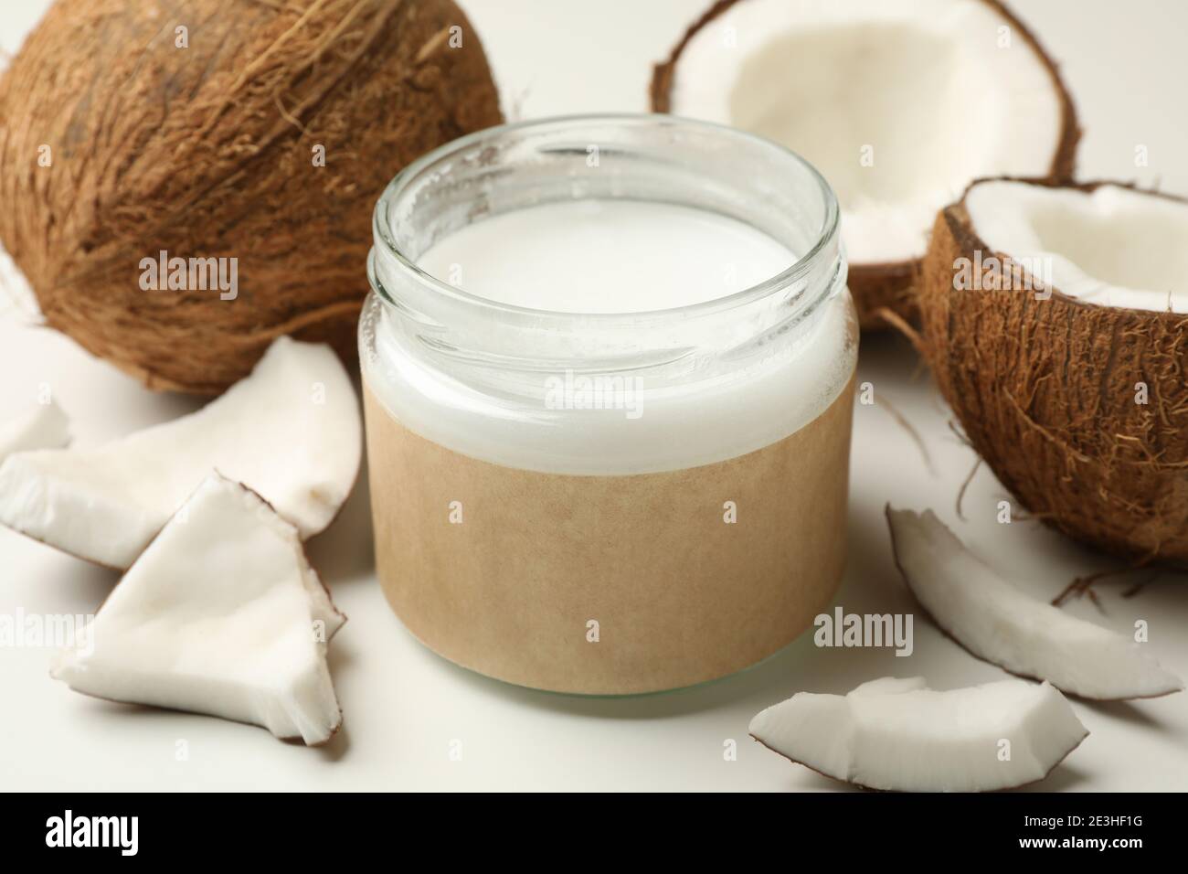 Fresh coconut and coconut milk on white background Stock Photo - Alamy