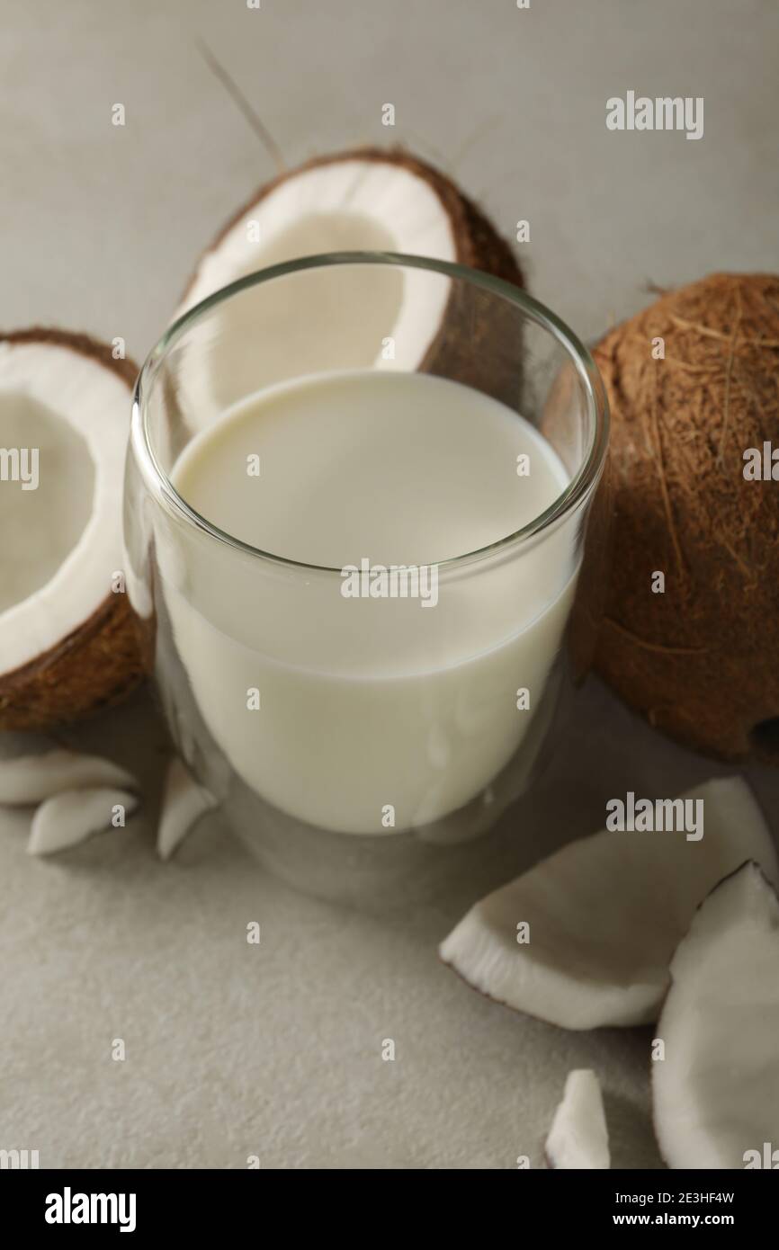 Fresh coconut and coconut milk on white background Stock Photo - Alamy