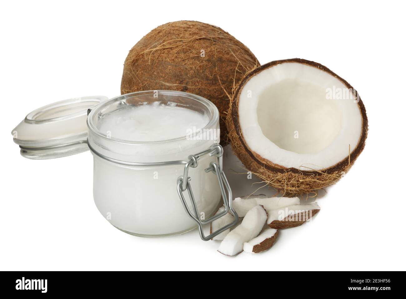 Coconut and jar of coconut milk isolated on white background Stock ...