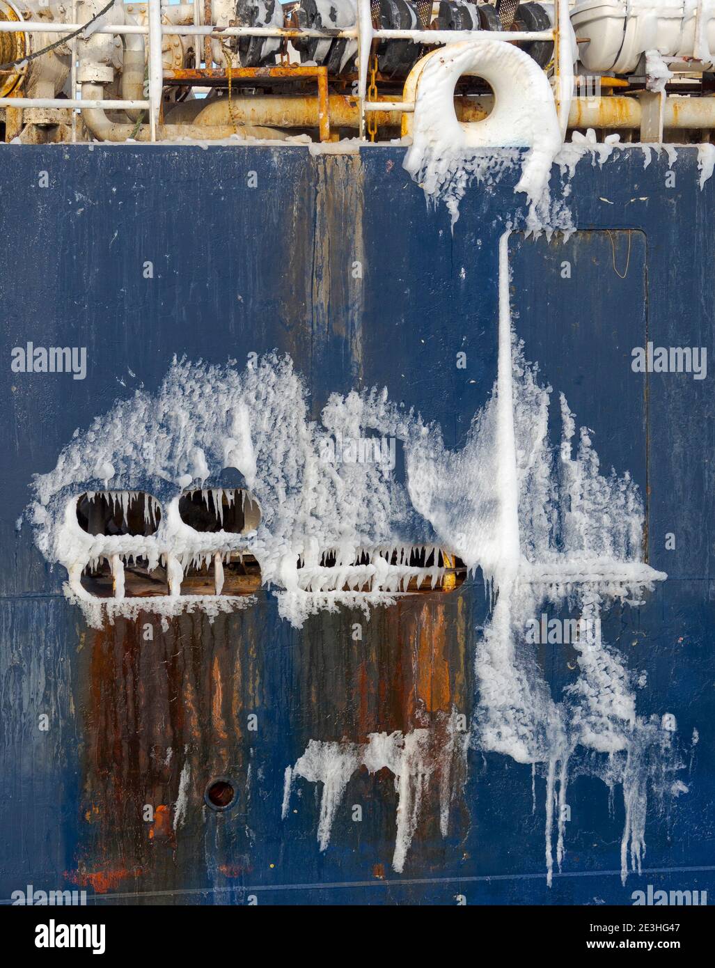 Scupper with icicles. Trawler Lomur run by Royal Greenland. Winter in ...