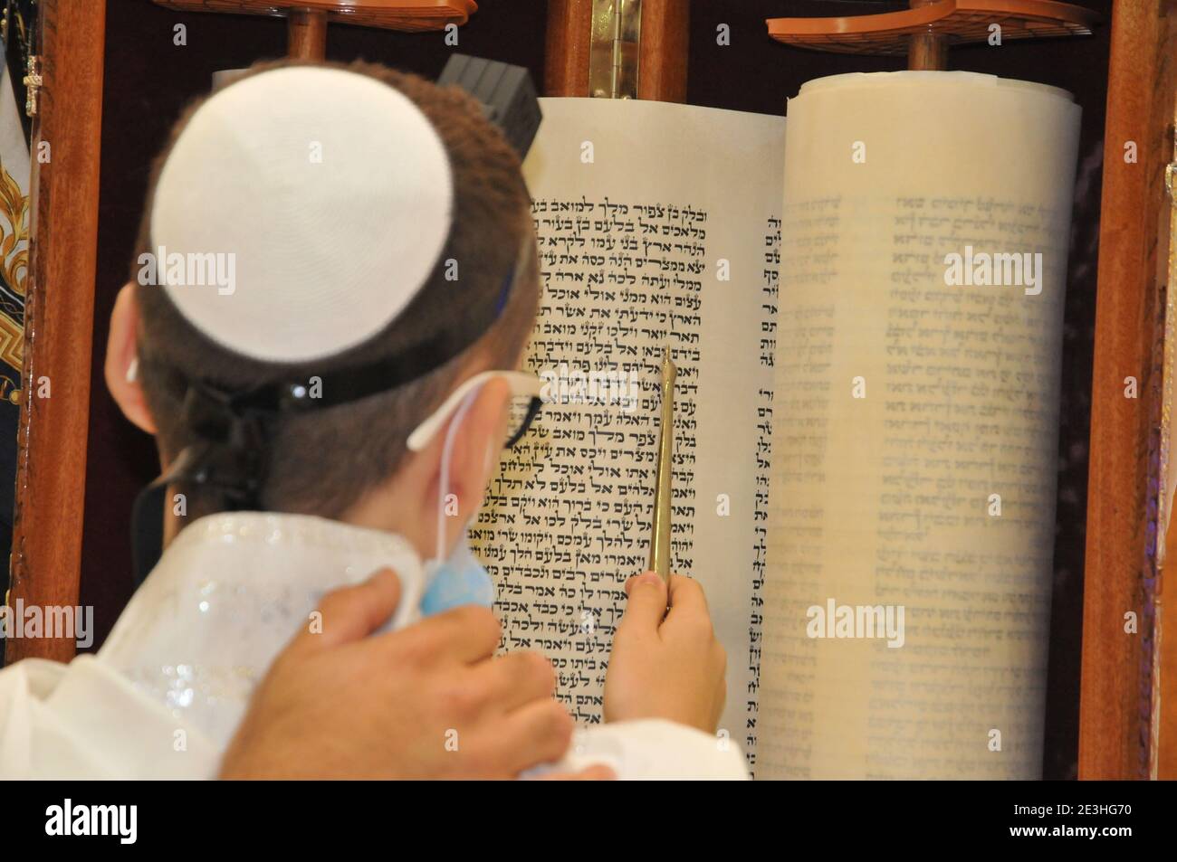 Bar Mitzvah concept A Jewish boy of thirteen is performing the rites to ...