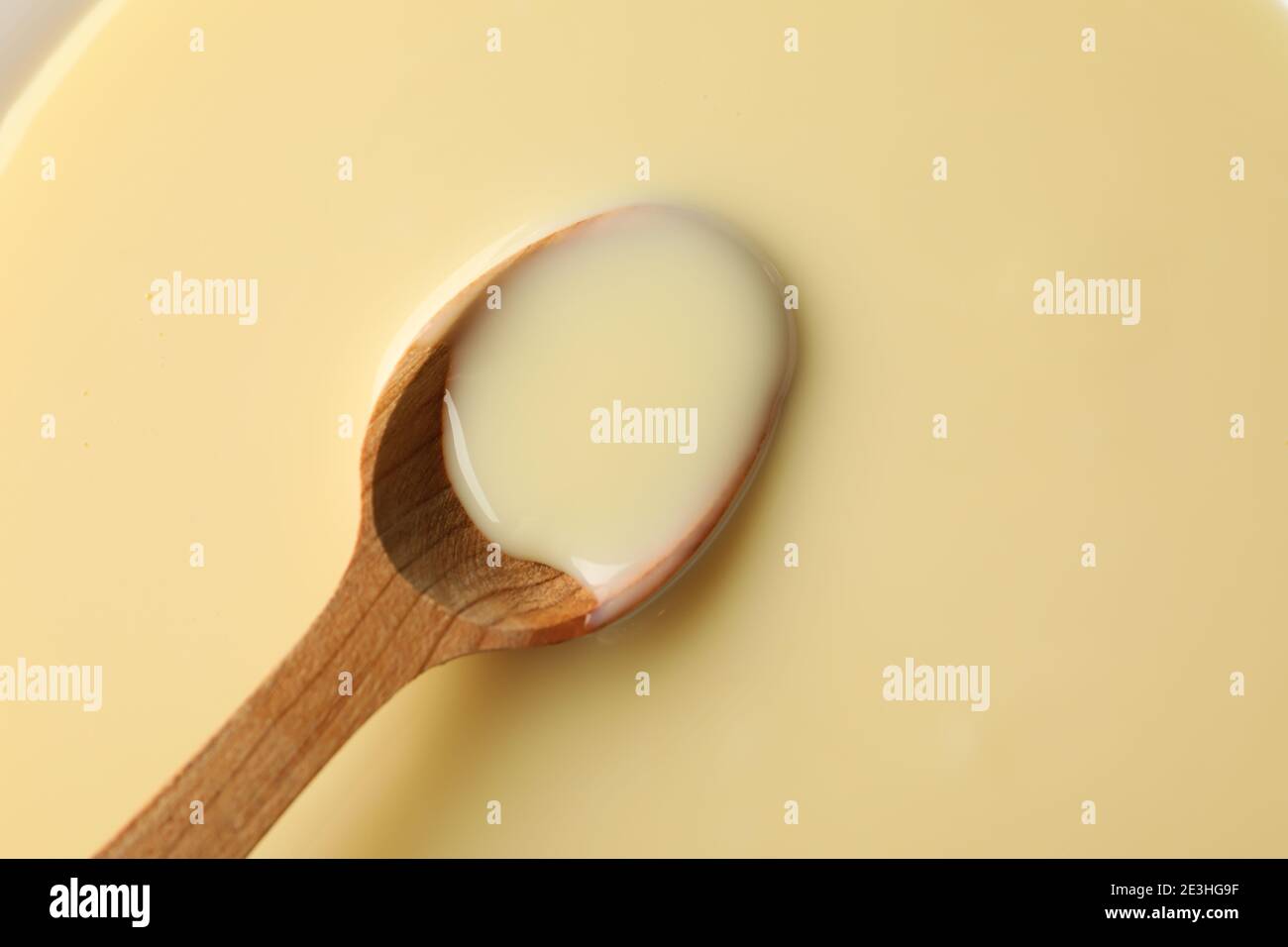 Condensed milk in bowl close hi-res stock photography and images - Alamy