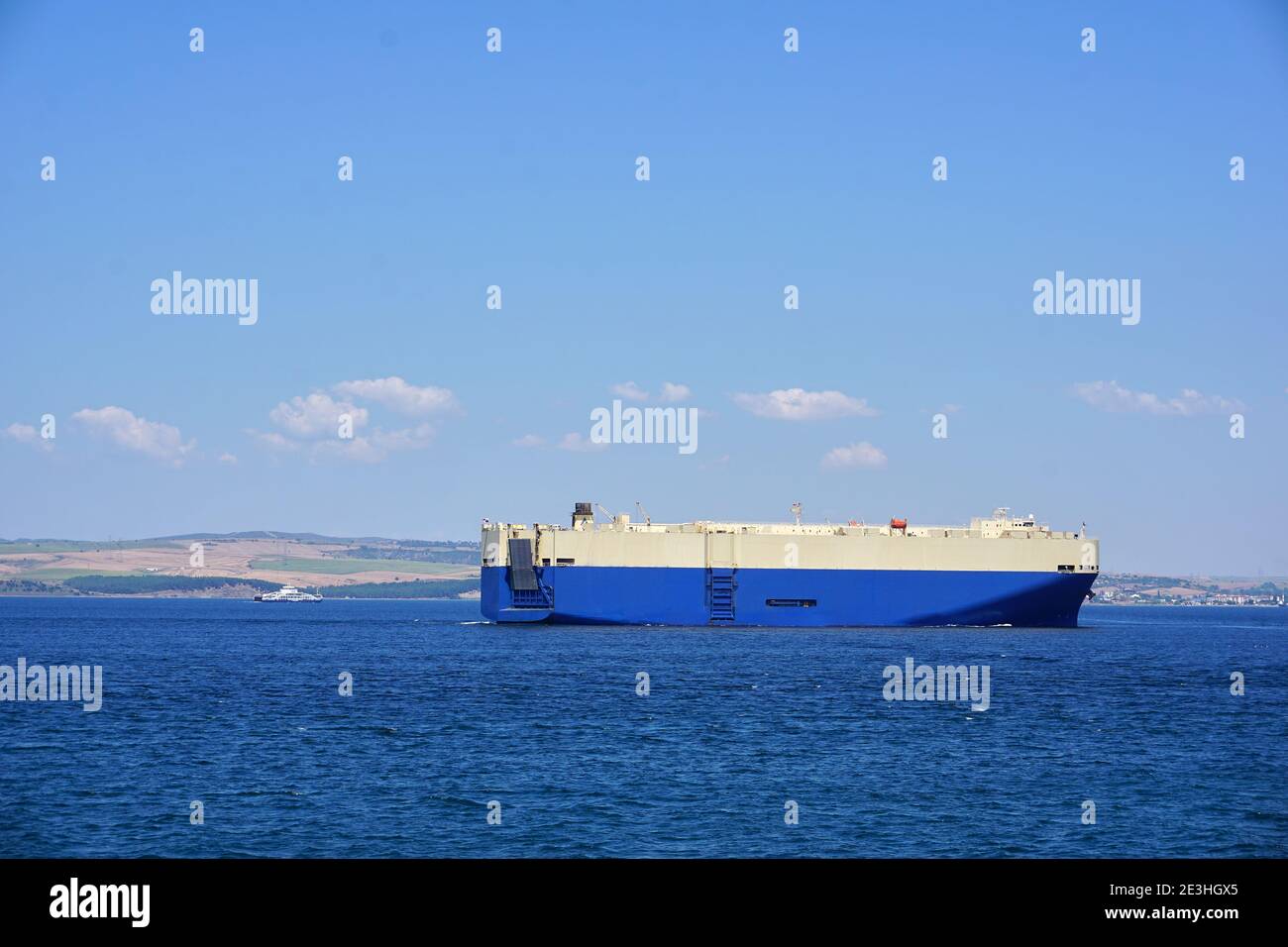 Big cargo ship crossing the strait Stock Photo - Alamy
