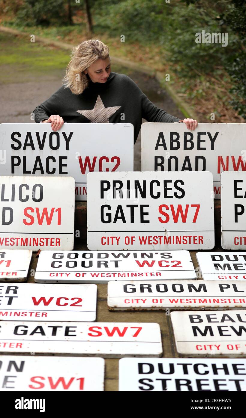 Catherine Southon amongst some of 260 London street signs before before ...