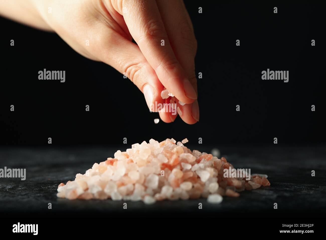 Salt shaker hand hi-res stock photography and images - Alamy