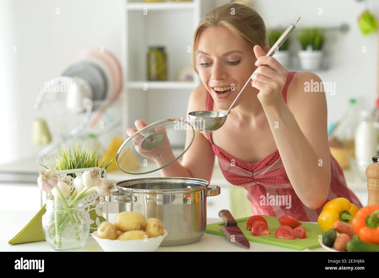 People serving in soup kitchen hi-res stock photography and images - Alamy