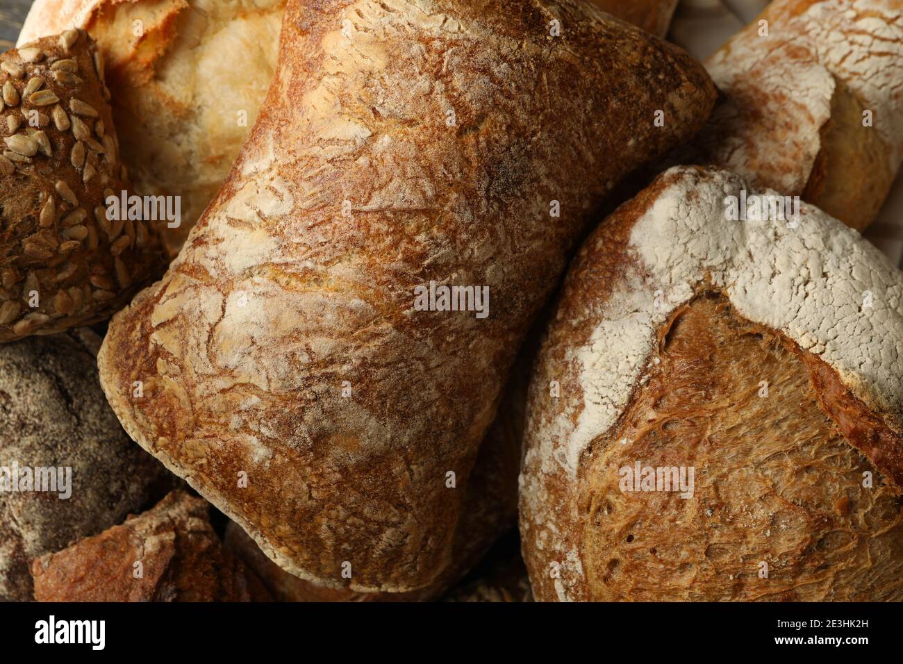 Fresh baked bread on whole background, close up Stock Photo - Alamy
