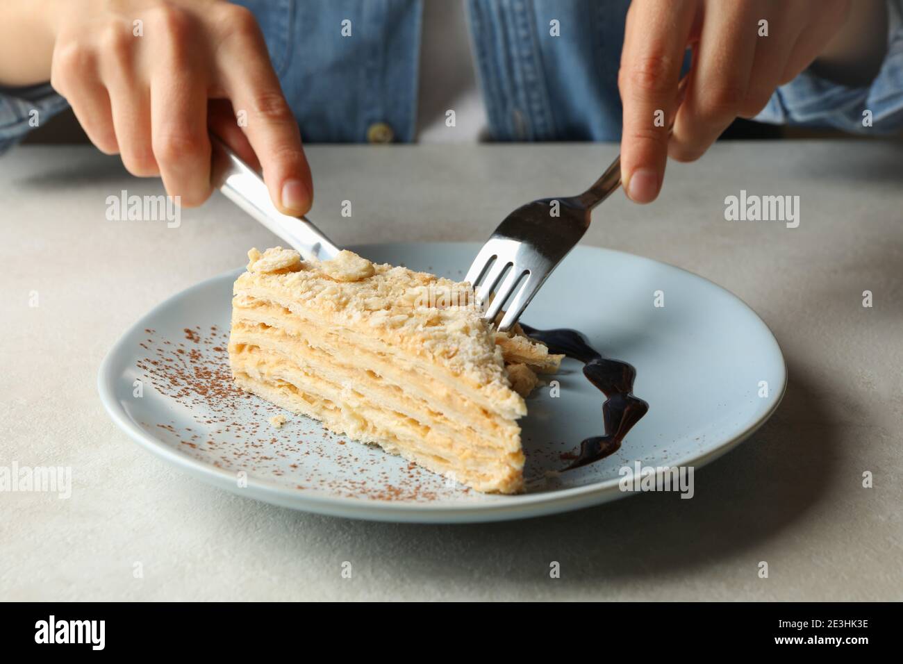 Woman eating piece cake birthday hi-res stock photography and images ...