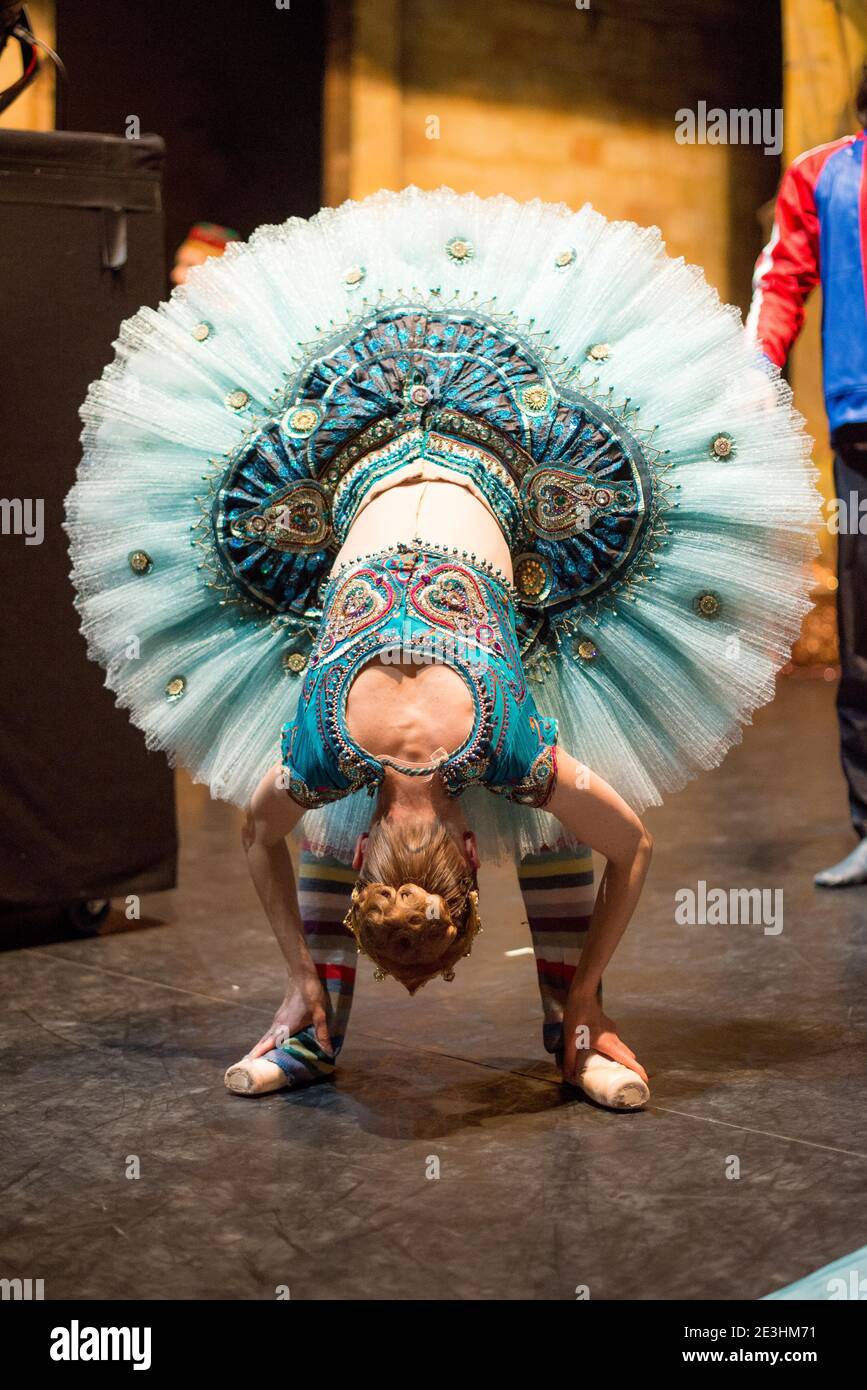 Ballerina in forward bend hi-res stock photography and images - Alamy