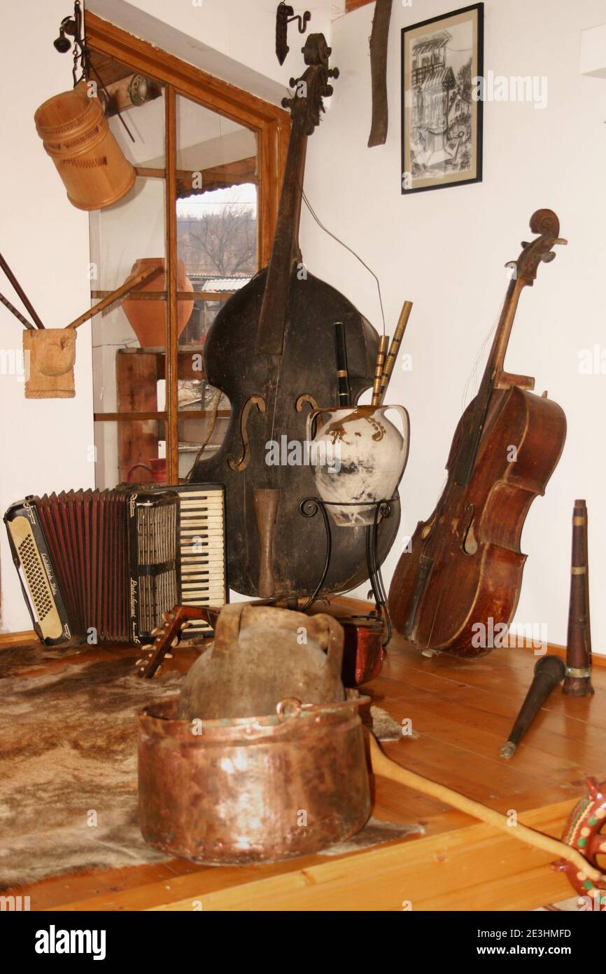Interior in Romania, with local artifacts and old musical instruments ...