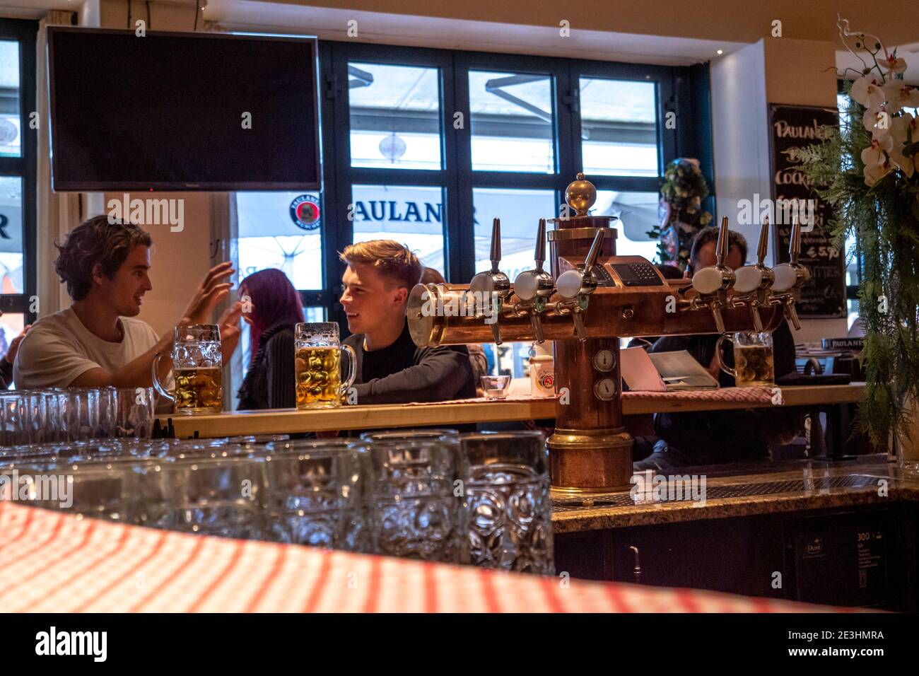 Two boys drinking beer in a bar from Munich Stock Photo - Alamy