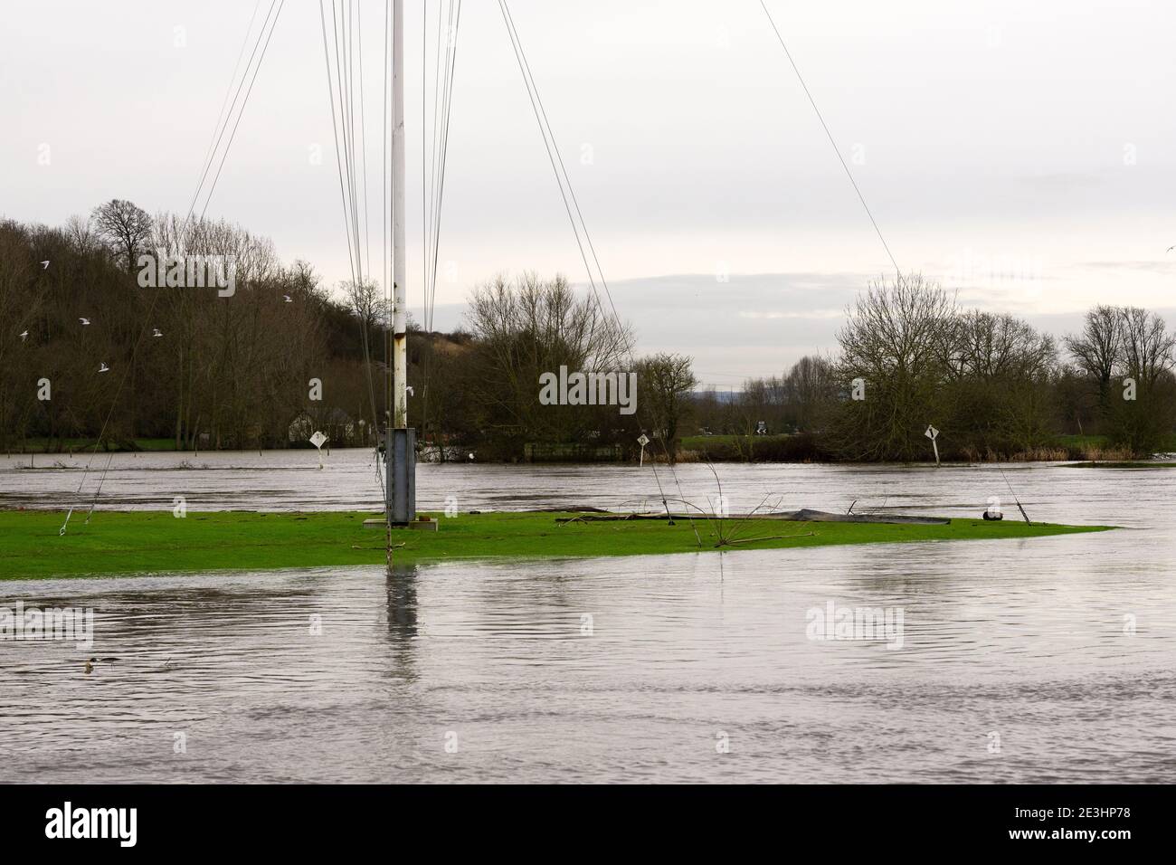 Land under threat from rising river water Stock Photo - Alamy