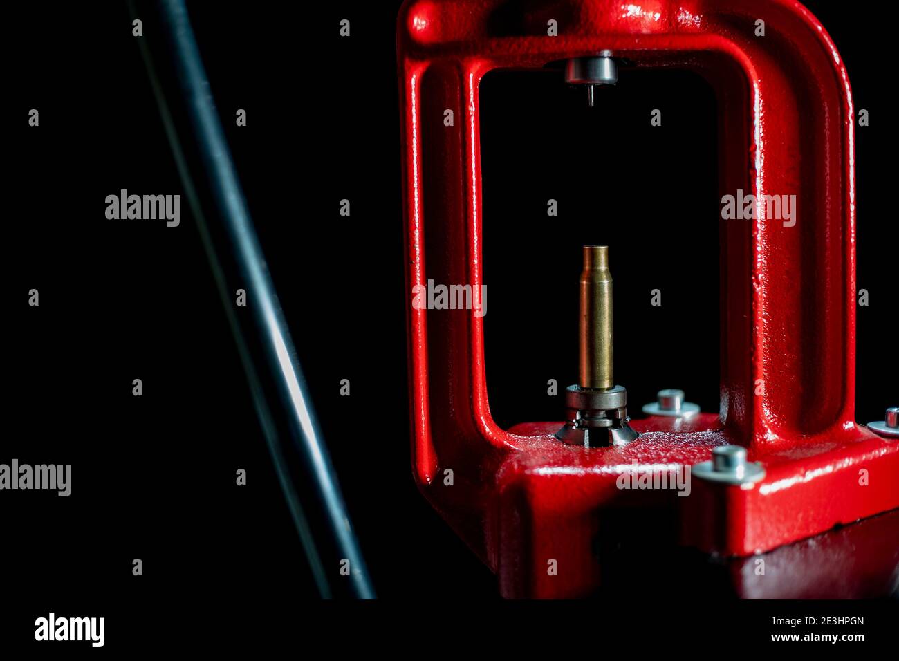 The process of making a rifle cartridge. Hand press and ammo shell ...