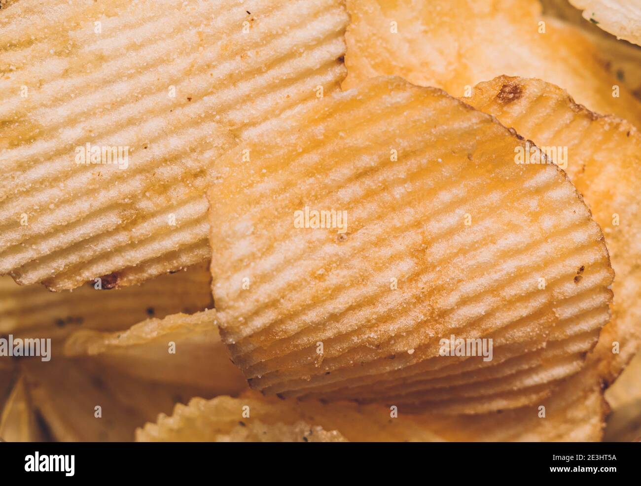 Potato chips or crisps background Stock Photo - Alamy