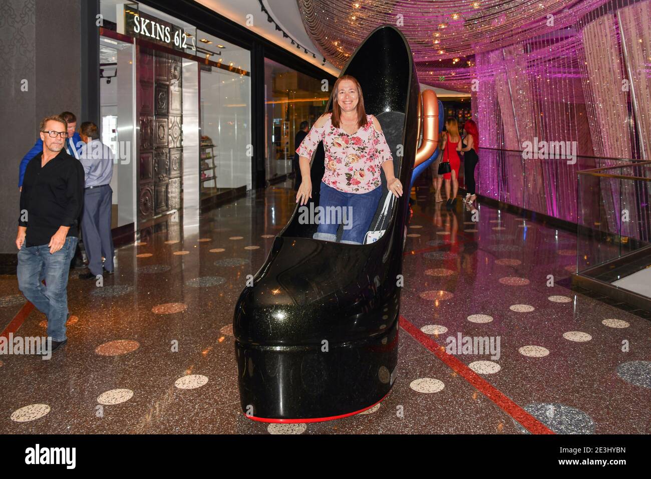 Nevada USA, 09-30-18 A beautiful lady poses for a photo on a giant high ...