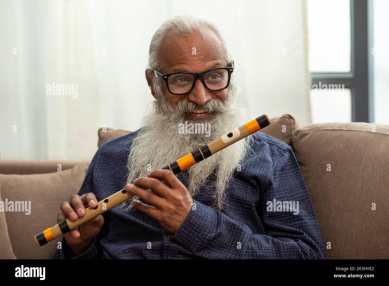 Indian Man Playing The Flute High Resolution Stock Photography and ...