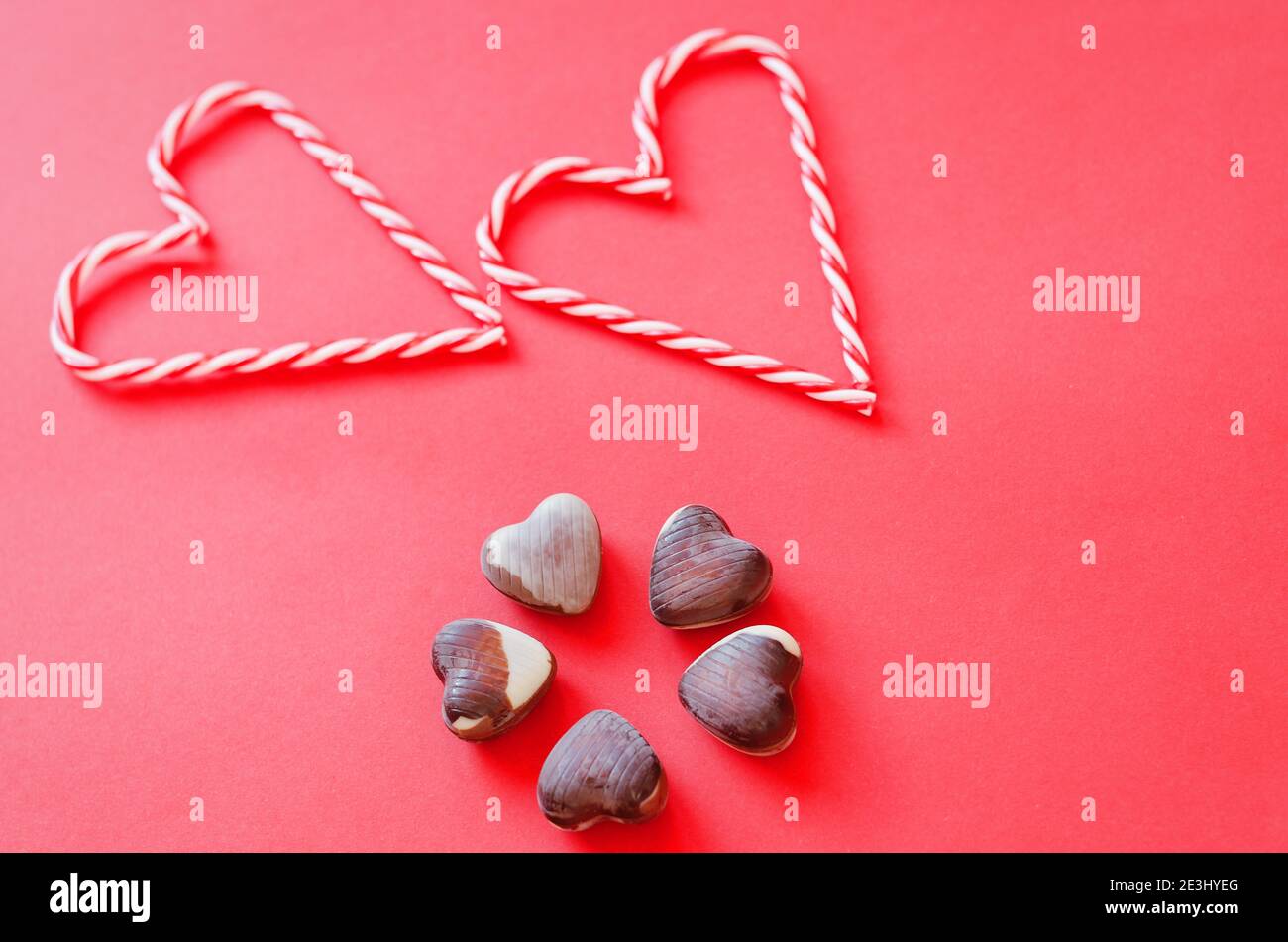 Festive red background. Hearts and sweet candies. Valentine Day. 14 of ...