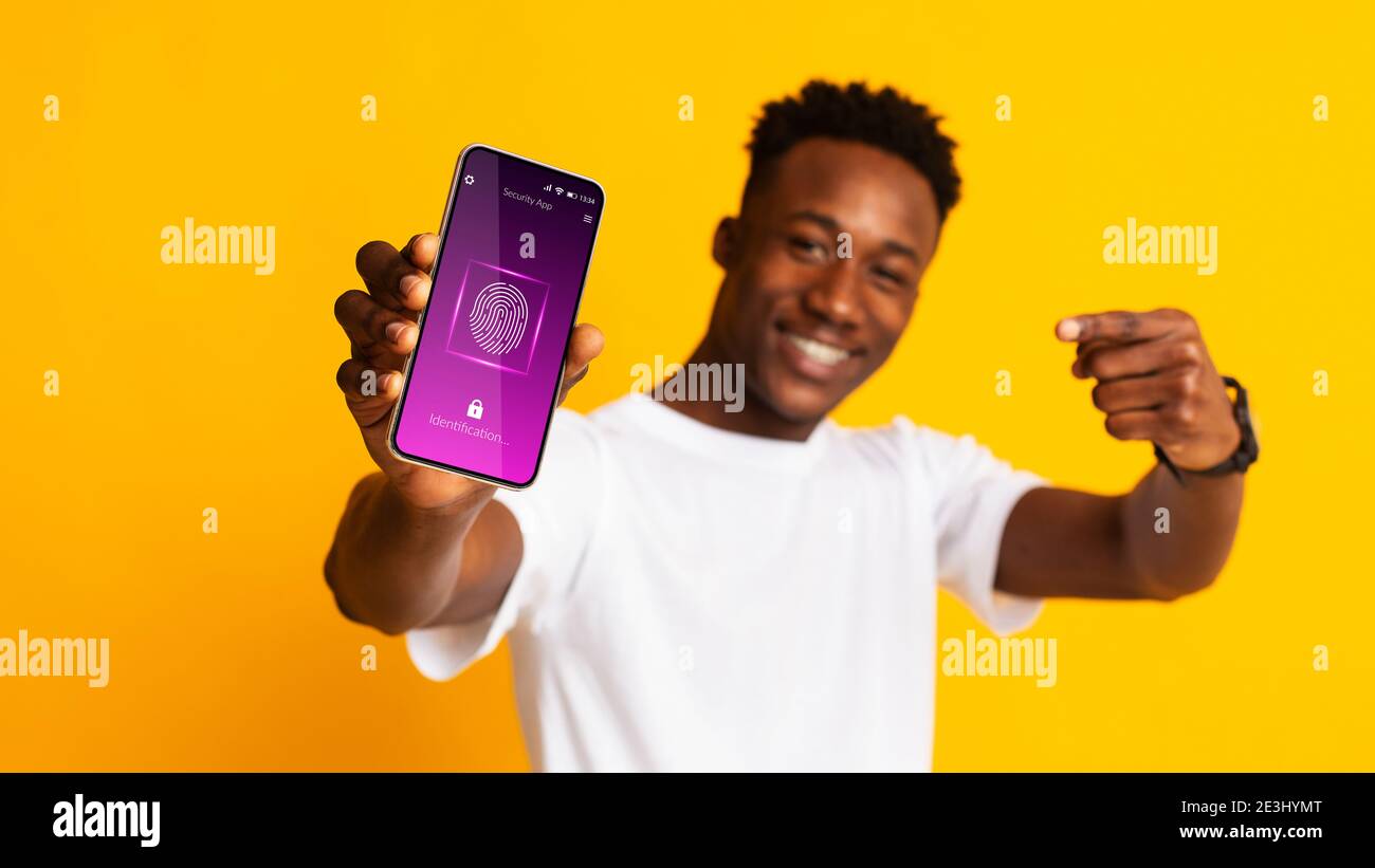 Black man showing identification hi-res stock photography and images ...