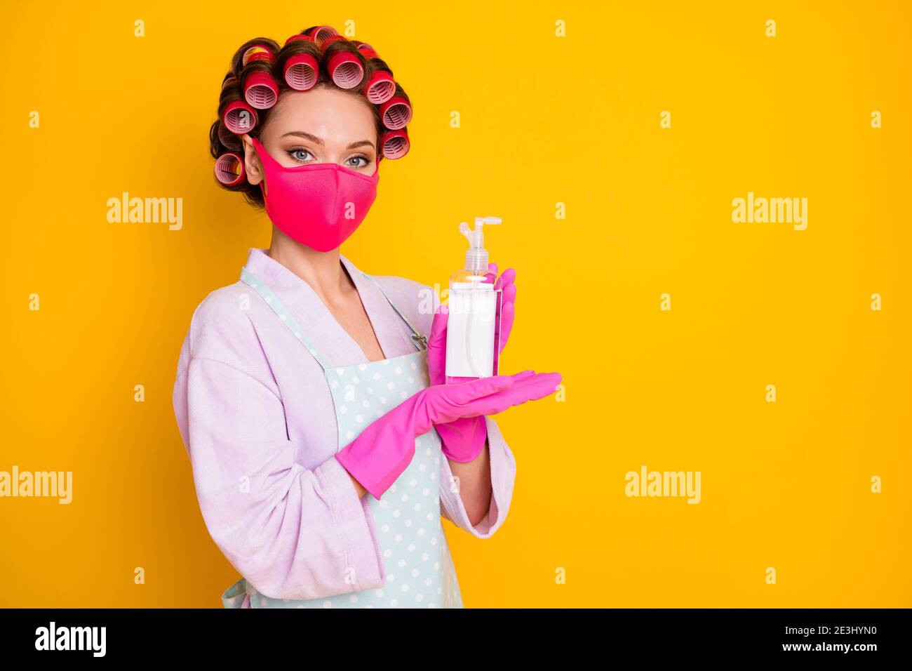 Profile side view portrait of nice maid wearing safety mask using ...