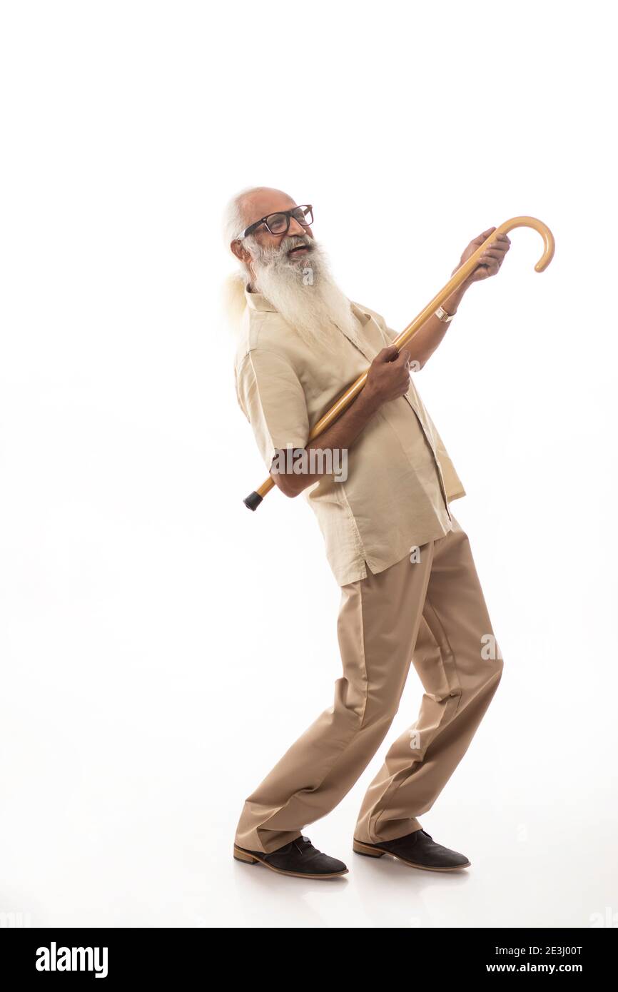 Old man walking stick hi-res stock photography and images - Alamy