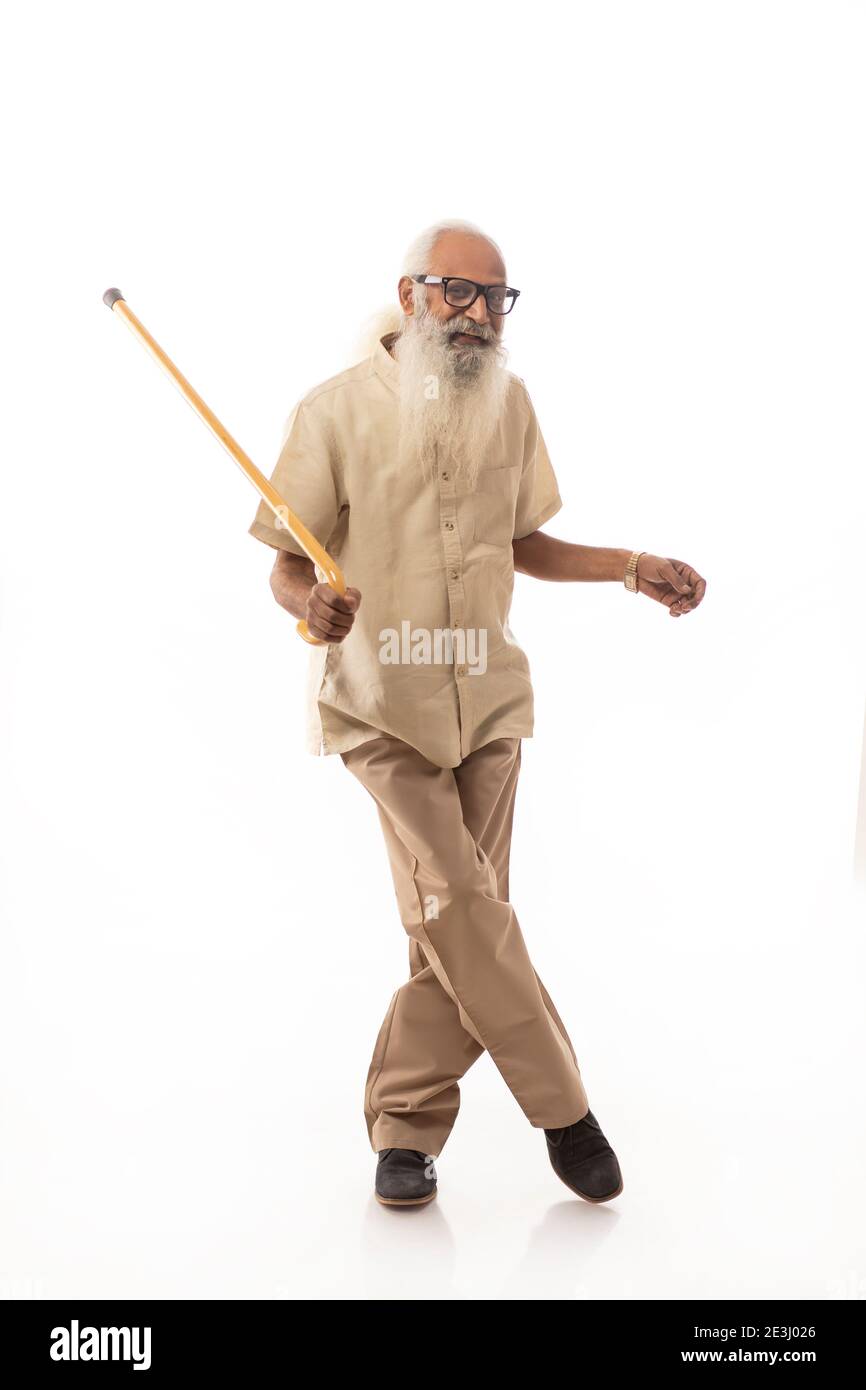 A HAPPY OLD MAN PLAYFULLY DANCING IN FRONT OF CAMERA Stock Photo - Alamy