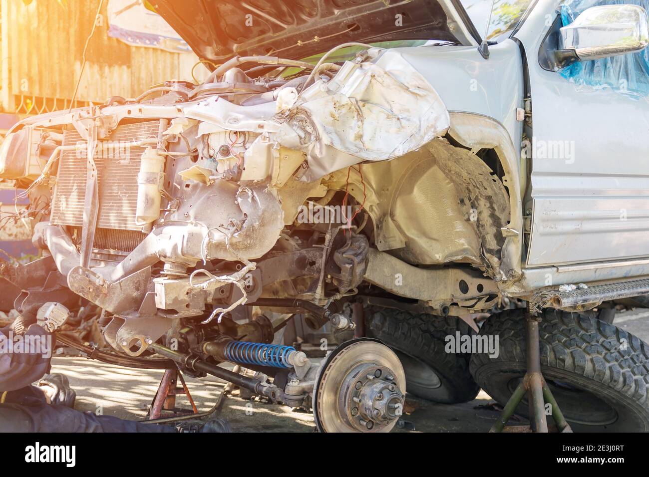 The front of the car is damaged by road accidents and parked waiting ...
