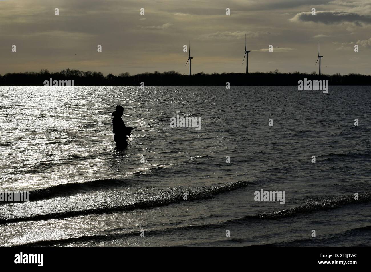 Solo fly fisherman at Grafham Water braving the cold in Winter while ...