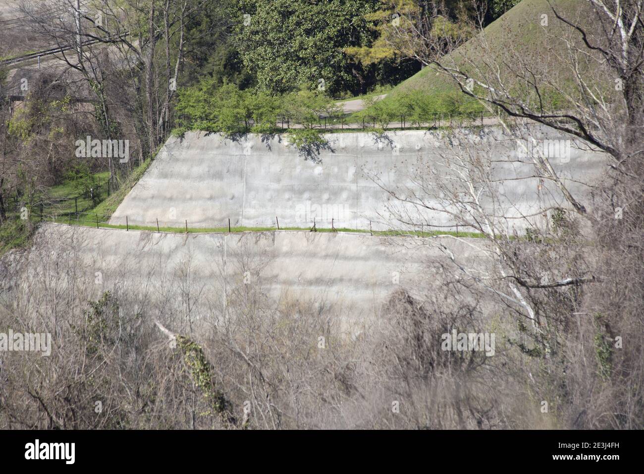 Close up of a concrete flood wall on a hillside near the Mississippi ...