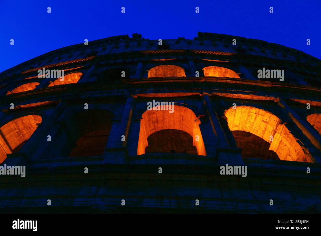 Architecture from Ancient Rome illuminated in the night . Arches of ...