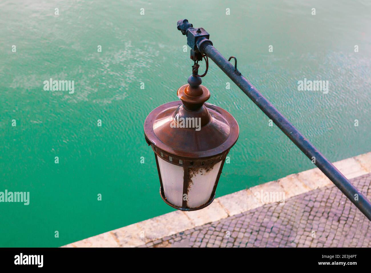 Riverside Street Lamp . Lamppost in medieval style Stock Photo - Alamy