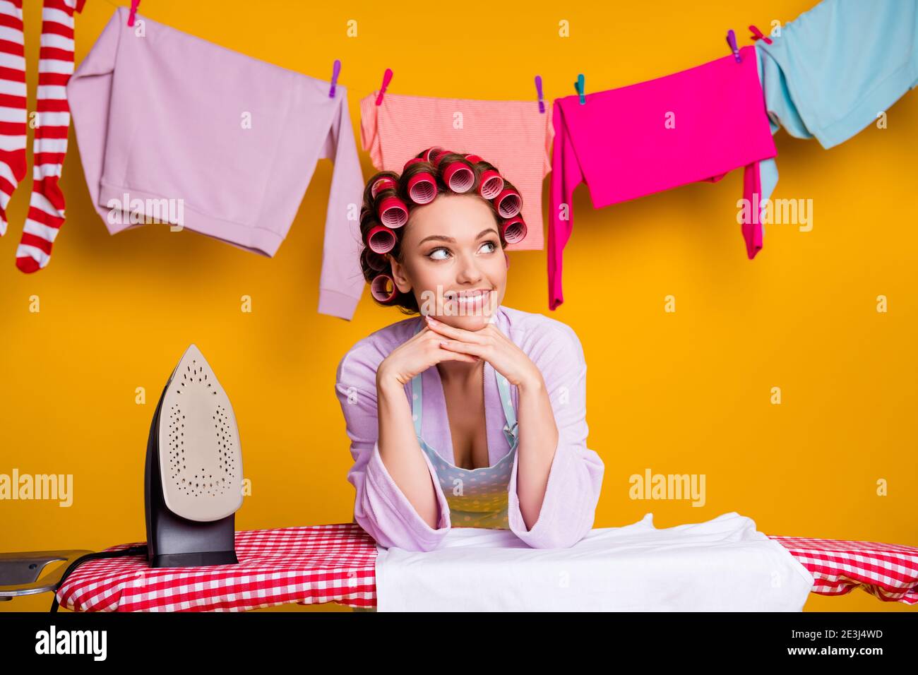 Portrait of glamorous cheerful funky minded maid thinking cleansing ...