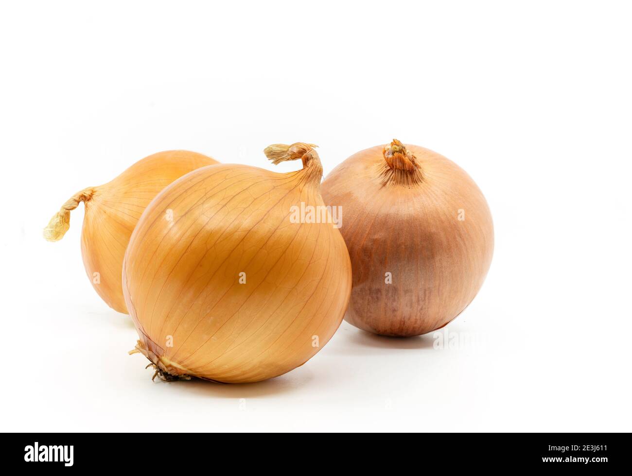 Close up group of onions on white background with clipping path, front ...