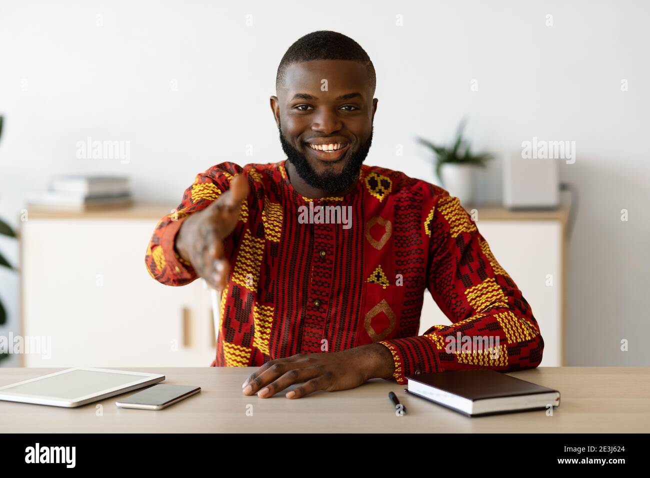 Handsome Black Man In Traditional African Costume Giving Hand For ...