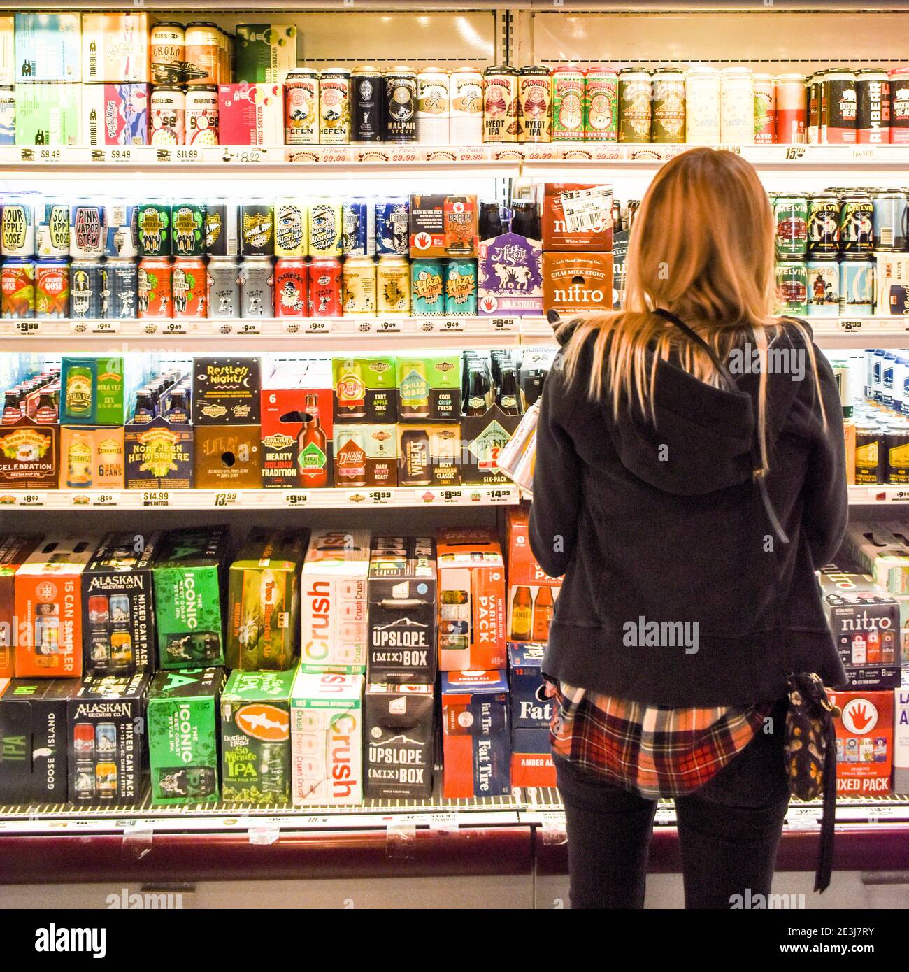Customer choosing beer Stock Photo - Alamy