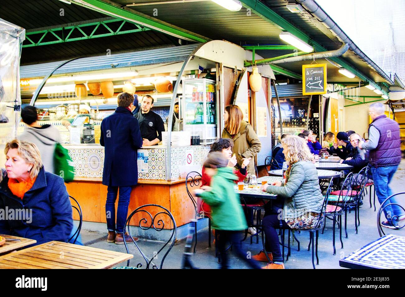 PARIS, FRANCE - JANUARY 28, 2017: People eat at Marche des Enfants ...