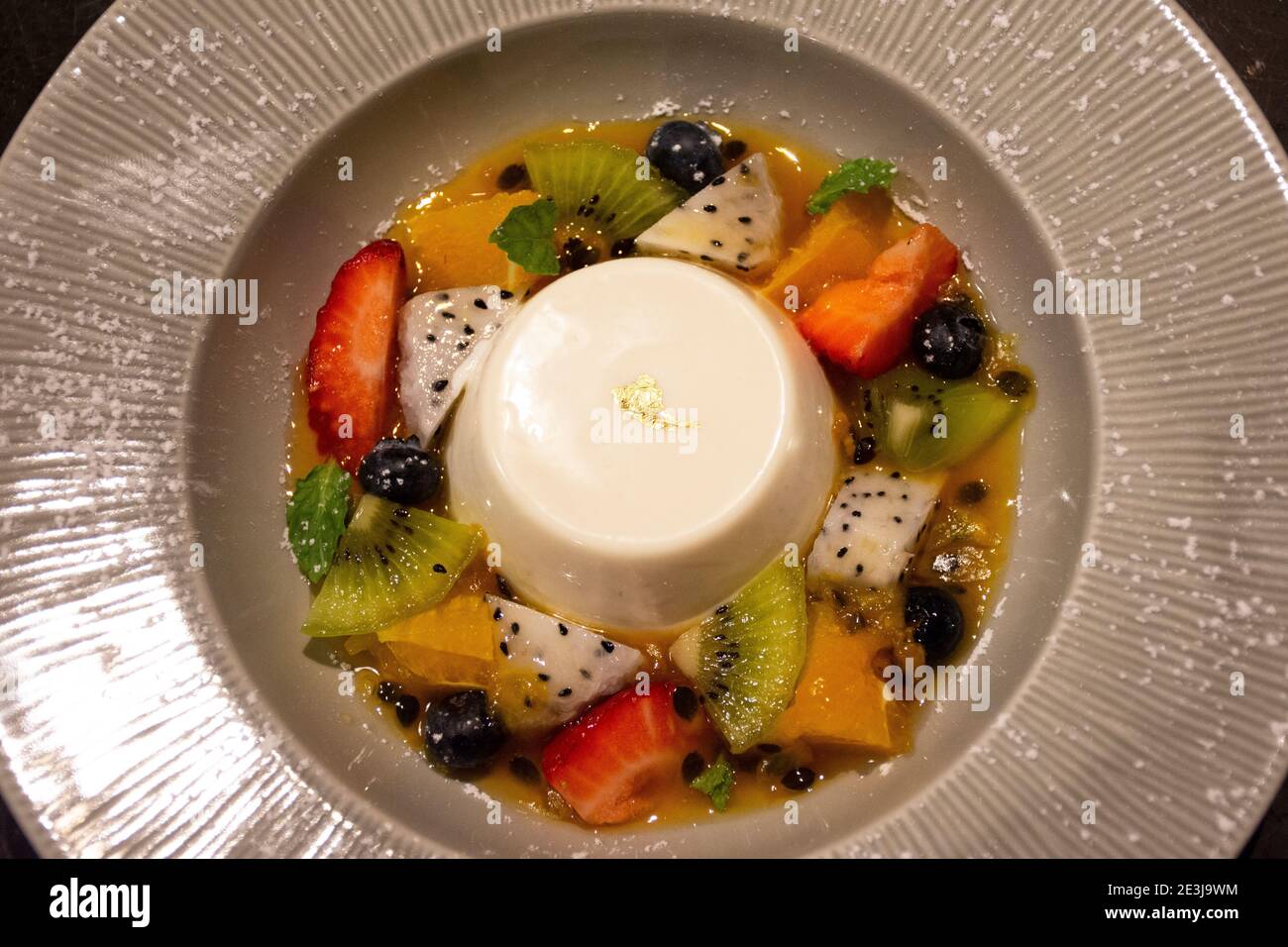 Soya bean curd or Soy Pudding serve with fruit salad and honey lime ...