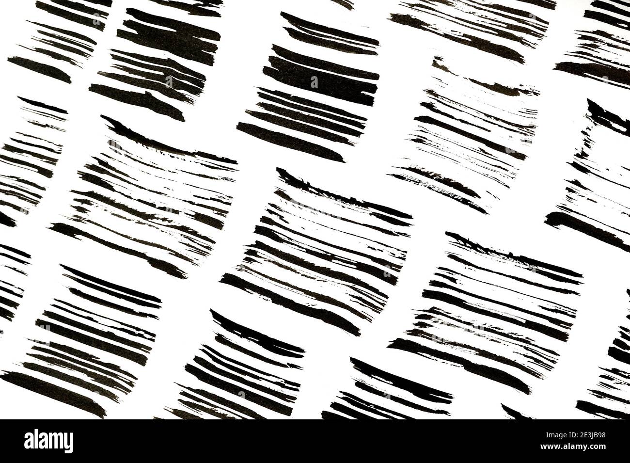 Black abstract brush strokes and splashes of paint on paper. Grunge art ...