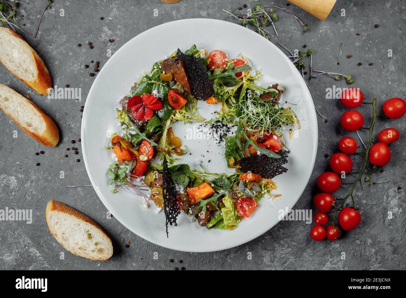 salad with pumpkin tomatoes and fried liver. Halloween Salad Stock ...