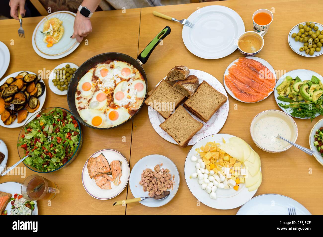 Table with a colorful fresh homemade food. Top down photo of a family ...