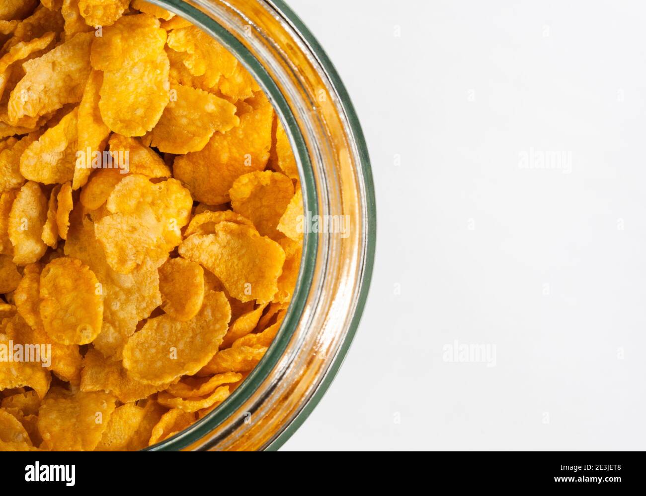 Breakfast flakes in a jar against a white background Stock Photo - Alamy