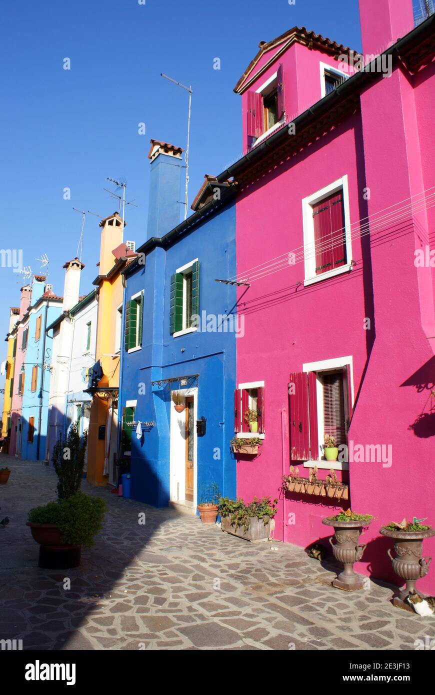 Row of traditional colourful painted burano houses hi-res stock ...