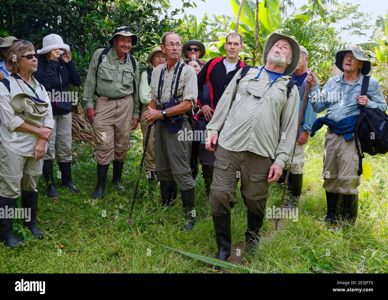 seed spitting contest, group watching, men, women, fun, competition ...
