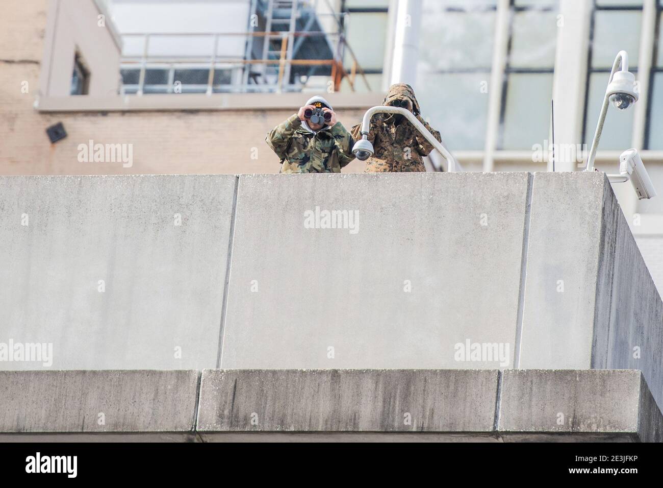 RICHMOND, VIRGINIA, JANUARY 18- Police officers monitor a second ...